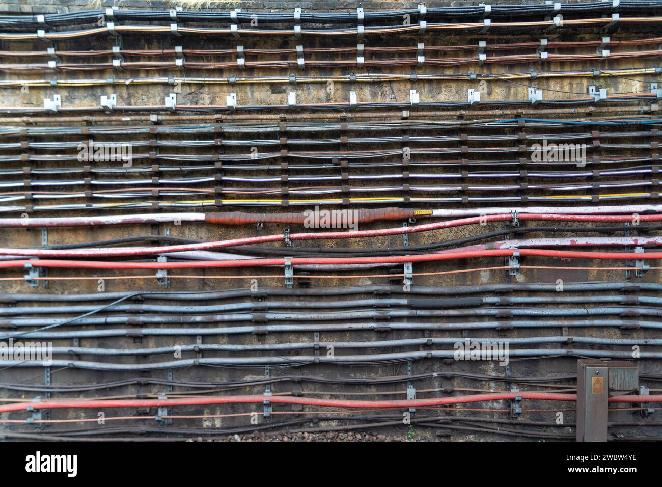 Wiring running along wall for technical wallpaper backgrop Stock Photo ...