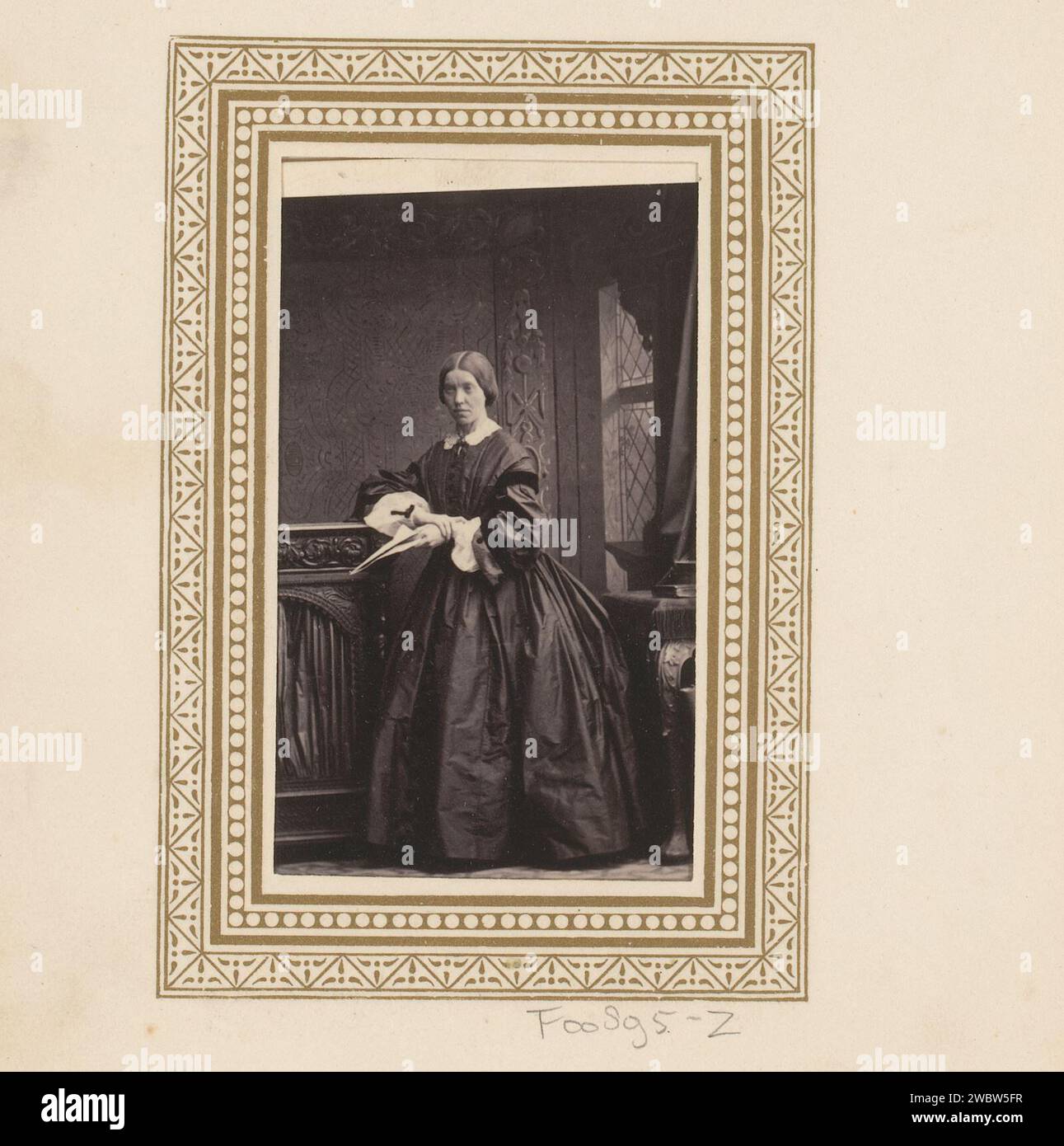 Portrait Woman with Paper Sheet on Furniture With Books, Camille Leon ...