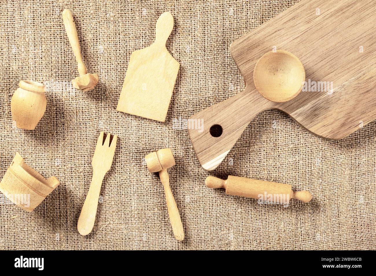 Rustic Top View Display of Wooden Kitchenware on Burlap Background ...