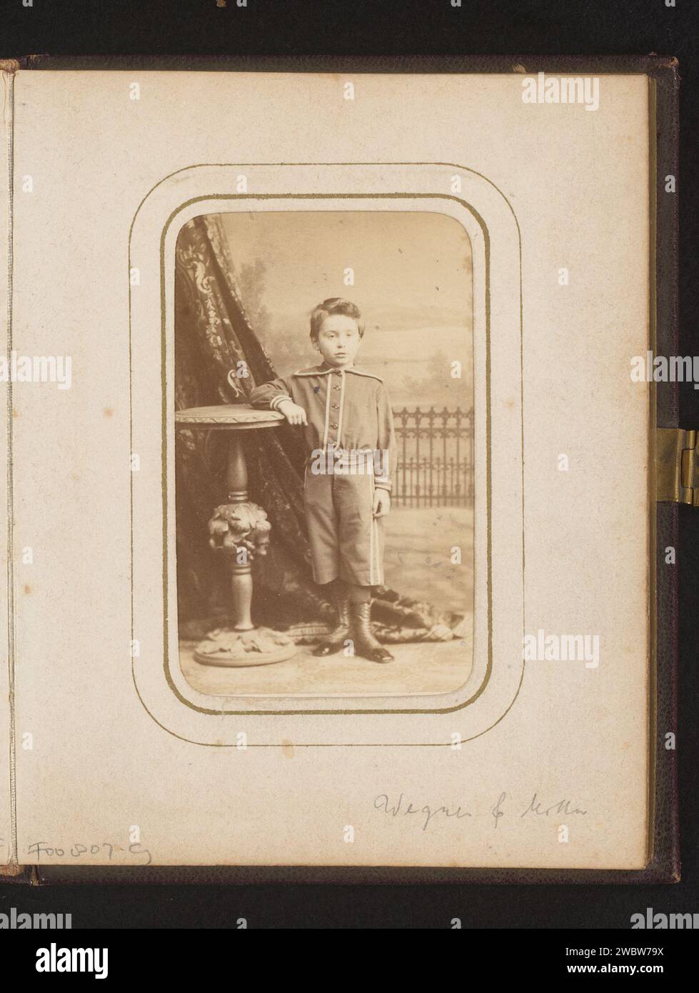 Portrait of a boy standing at a table, Wegner & Mottu, 1865 - 1900 ...