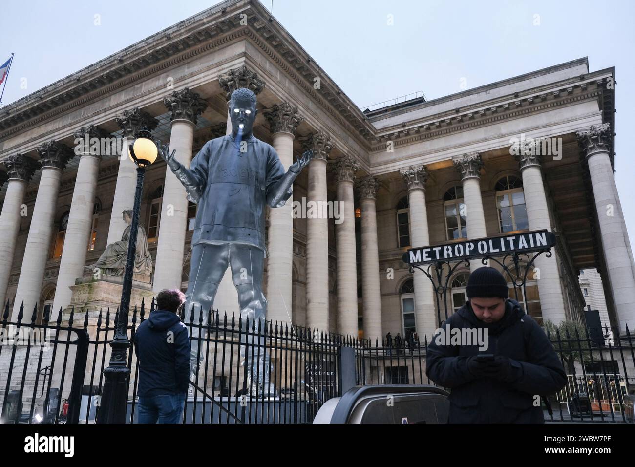 Paris, France. 12th Jan, 2024. A ten-meter-high ephemeral figure of Kid ...