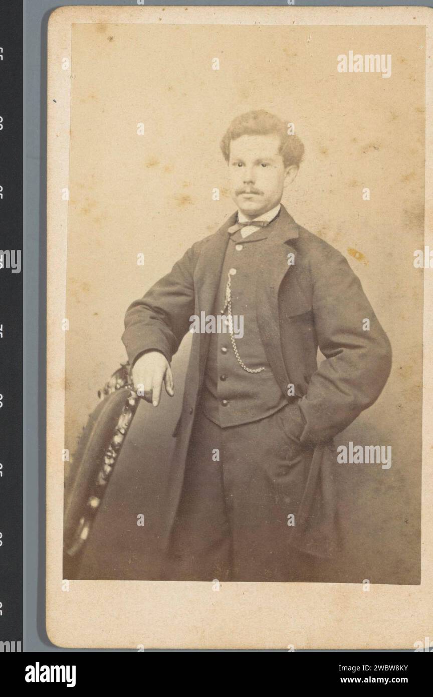 Portrait of an unknown man, standing next to a chair, Christian ...