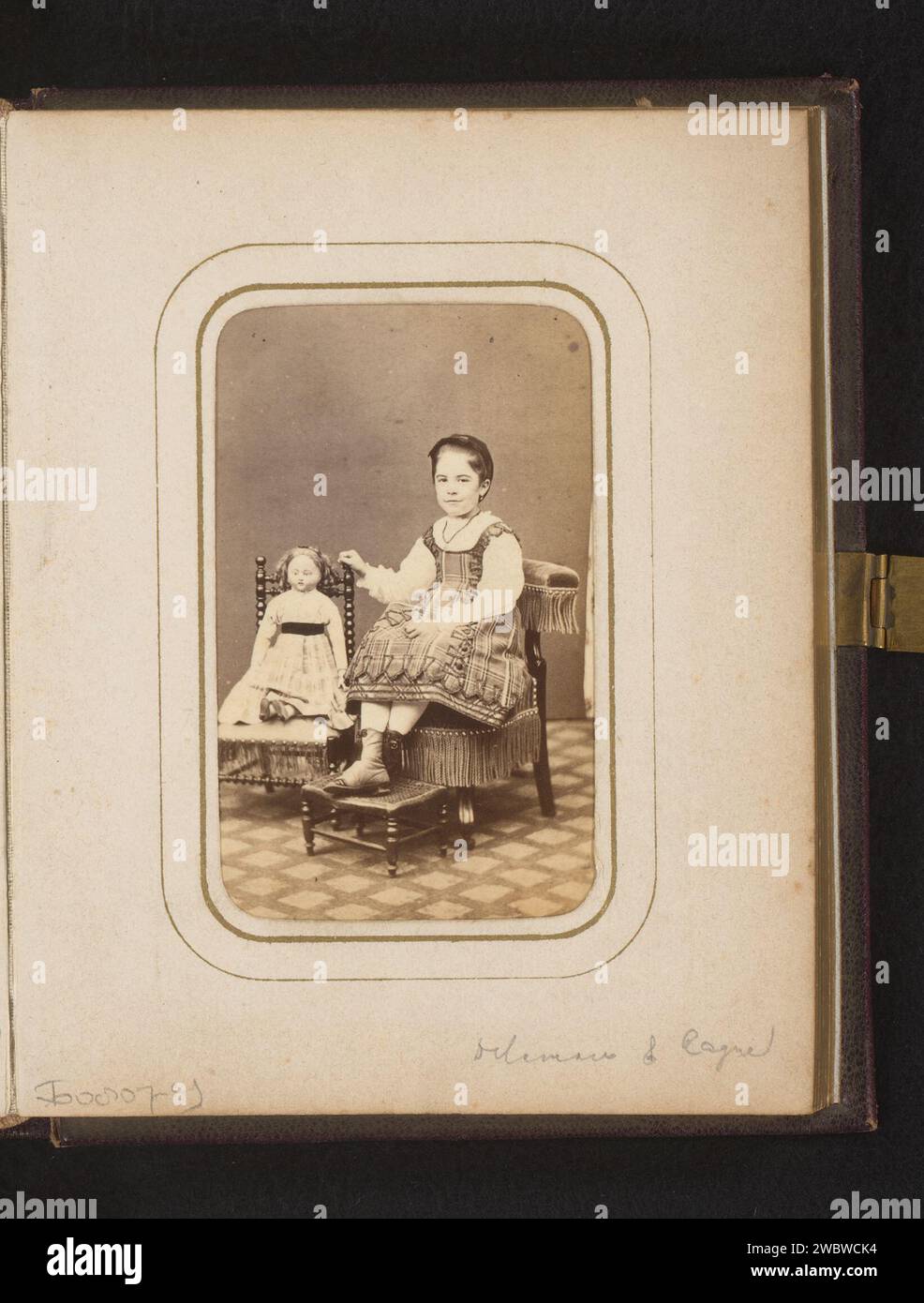 Portrait of a sitting girl with footstool and a doll on a chair, A ...