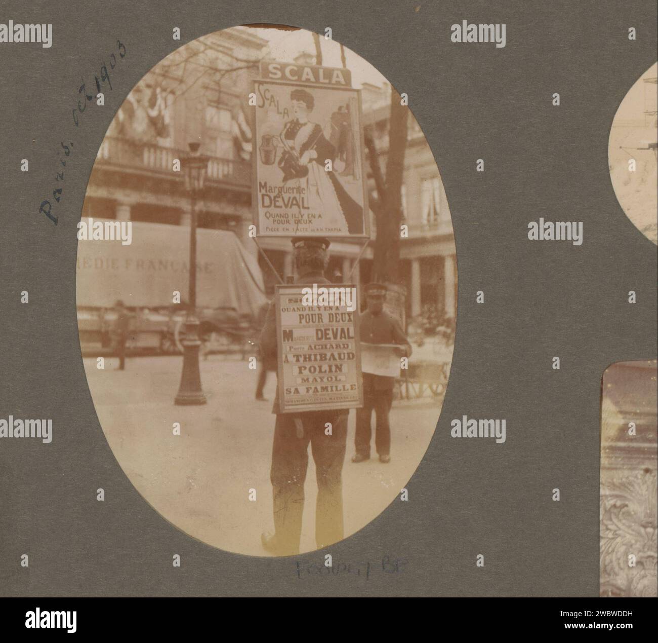 Sandwichman on the street in Paris with advertising for 'Quand il y and ...