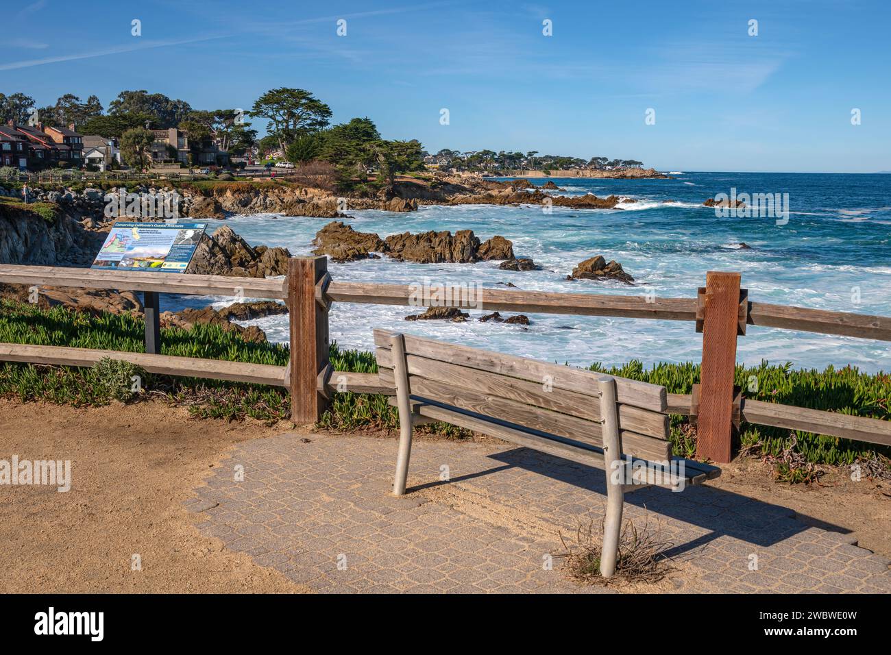 A bench with a view in Monterey California and shoreline habitat Stock ...