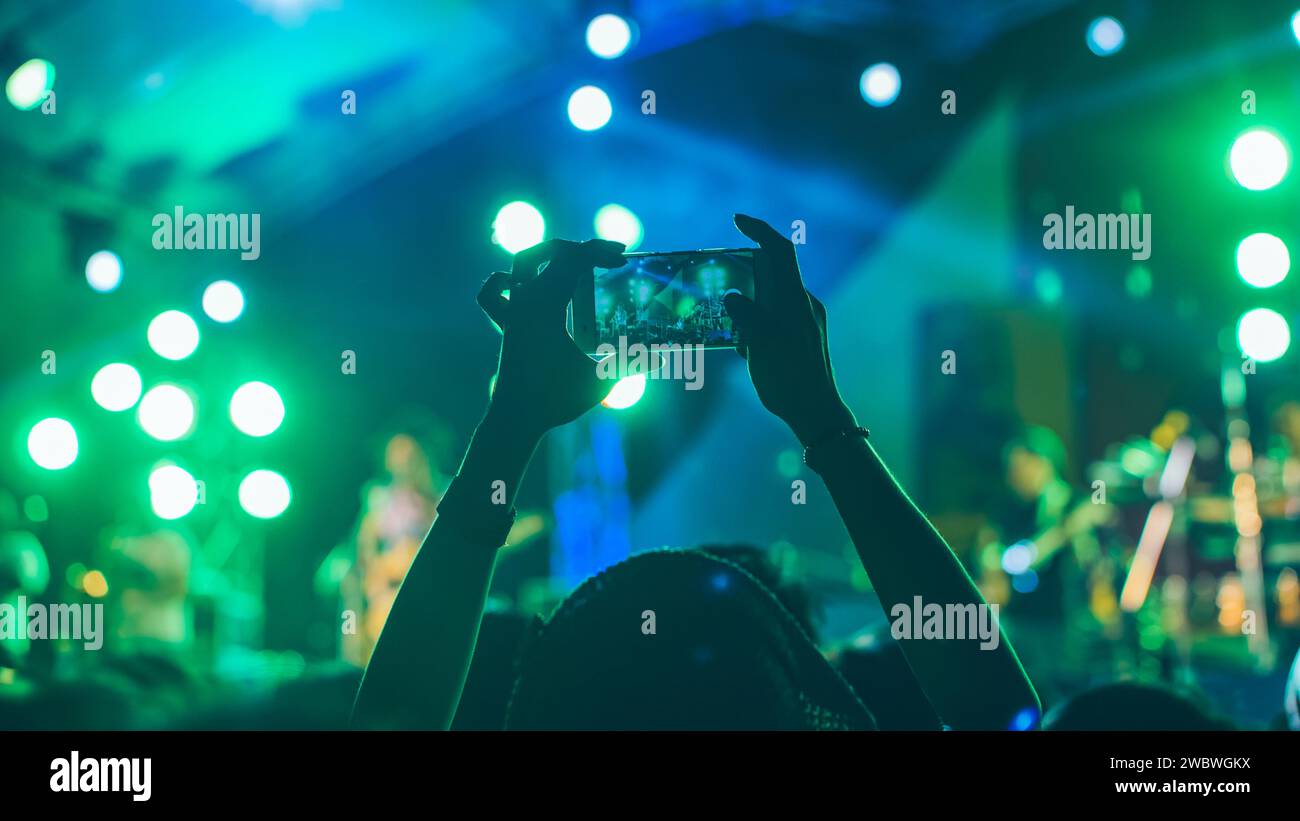 Person in focus in blurred crowd hi-res stock photography and images ...