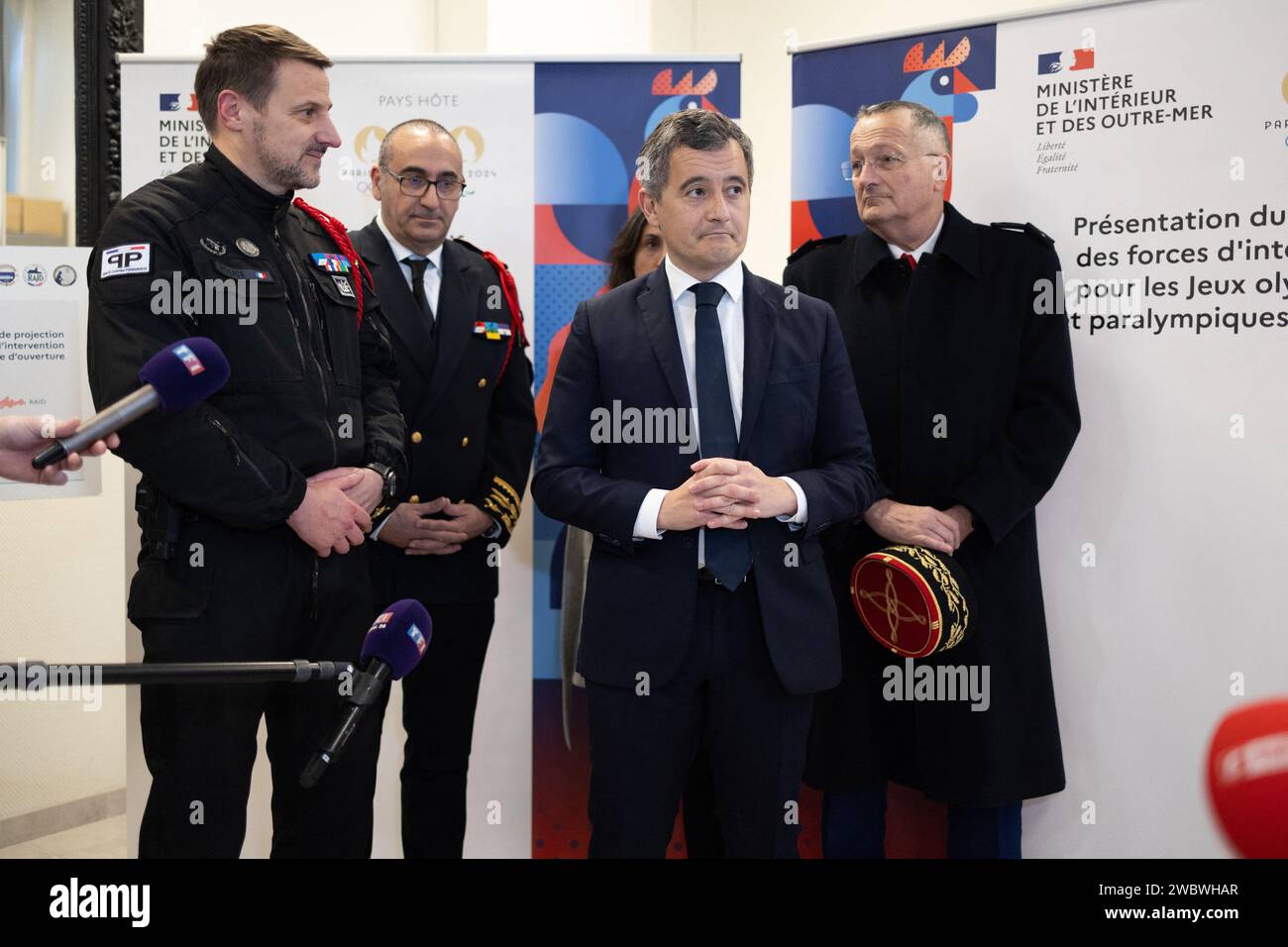 Bievres, France. 12th Jan, 2024. French Interior Minister Gerald Darmanin (R) and French ...