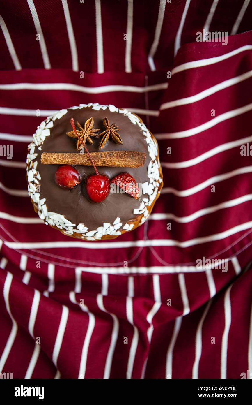 A traditional paska decorated with white and dark Swiss chocolate and ...