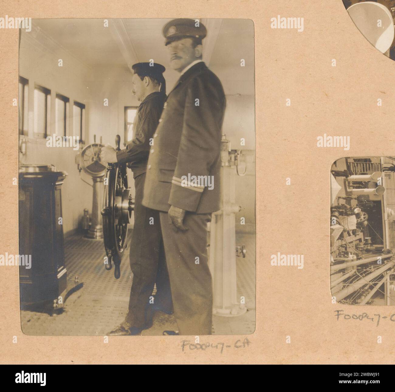 Sailors behind the steering wheel of a ship, 1906 photograph Part of a ...