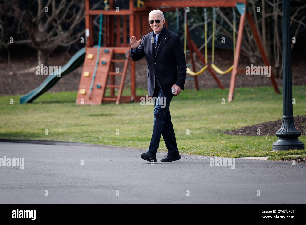 Washington, United States. 12th Jan, 2024. US President Joe Biden walks ...