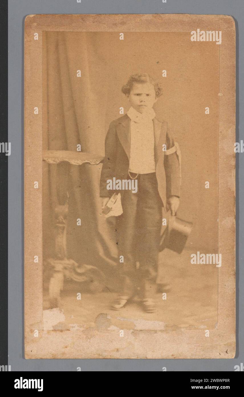 Portrait of an unknown boy dressed in a suit for the first Holy ...