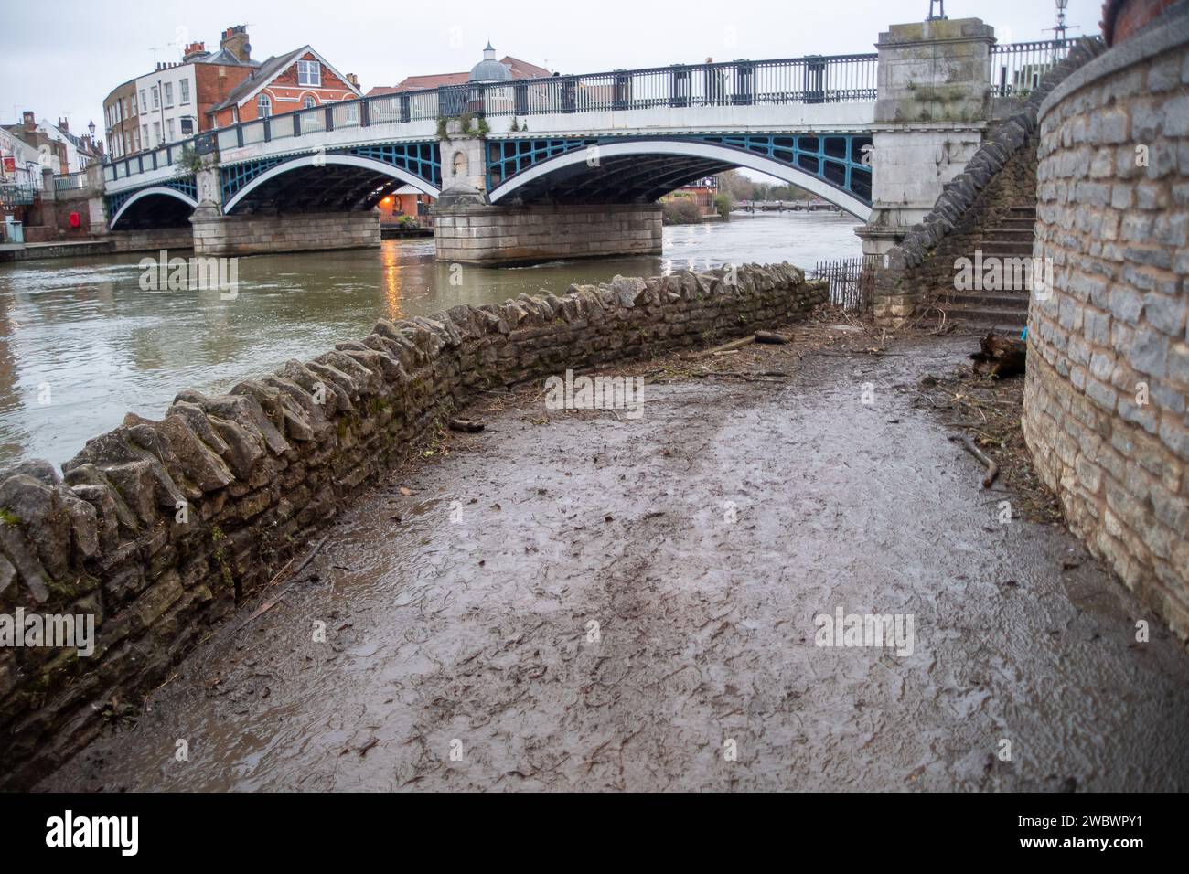 Windsor, UK. 12th January, 2024. Mud on Jennings Wharf next to the ...