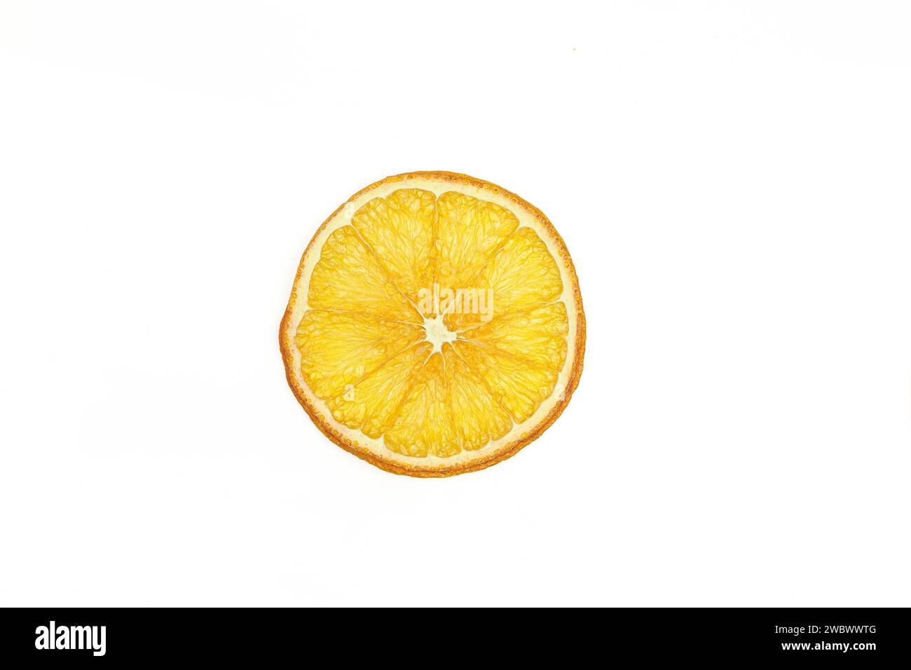 Sliced piece of dry dehydrated orange isolated on white background ...