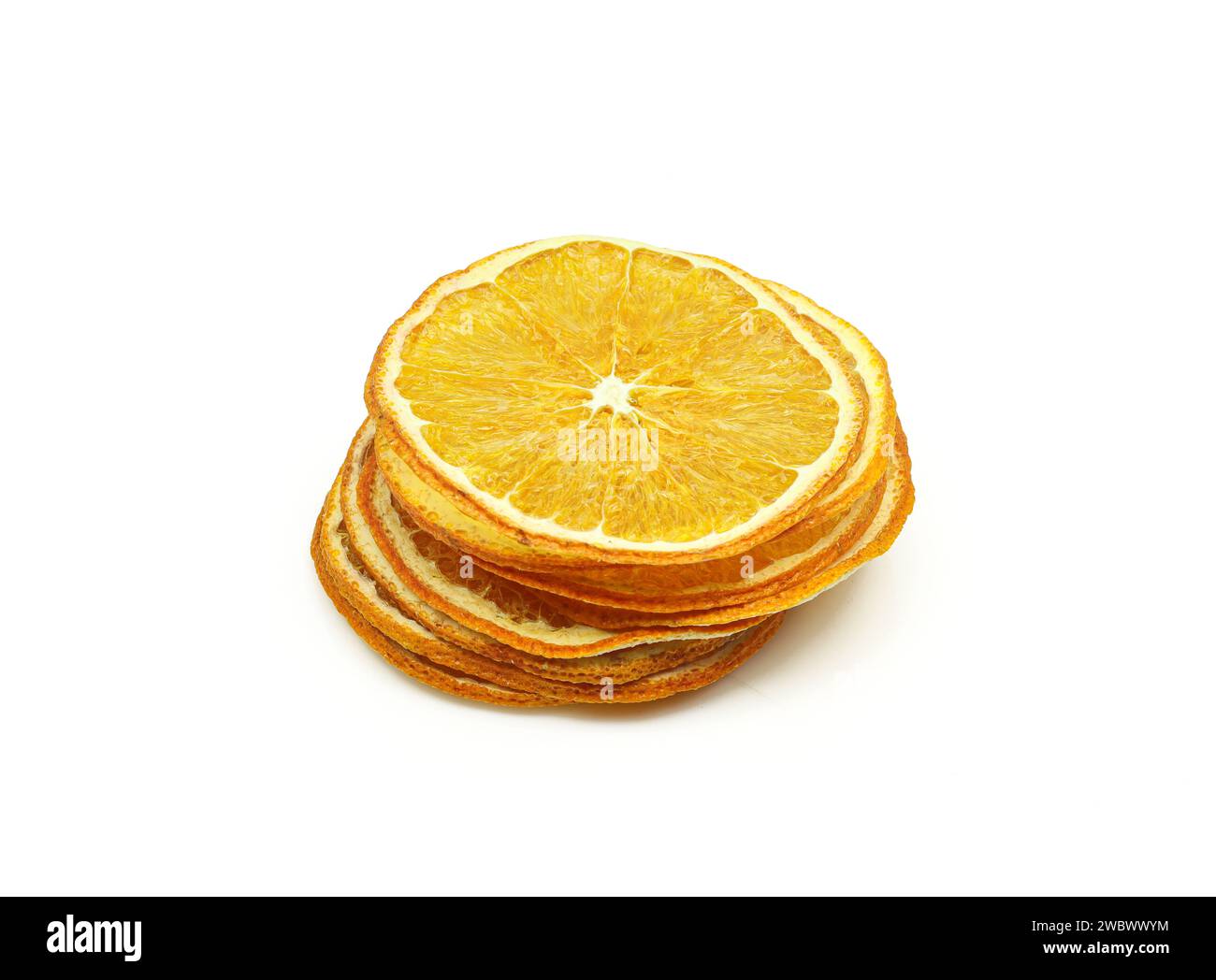 Stacked dehydrated slices of dried orange isolated on white background ...
