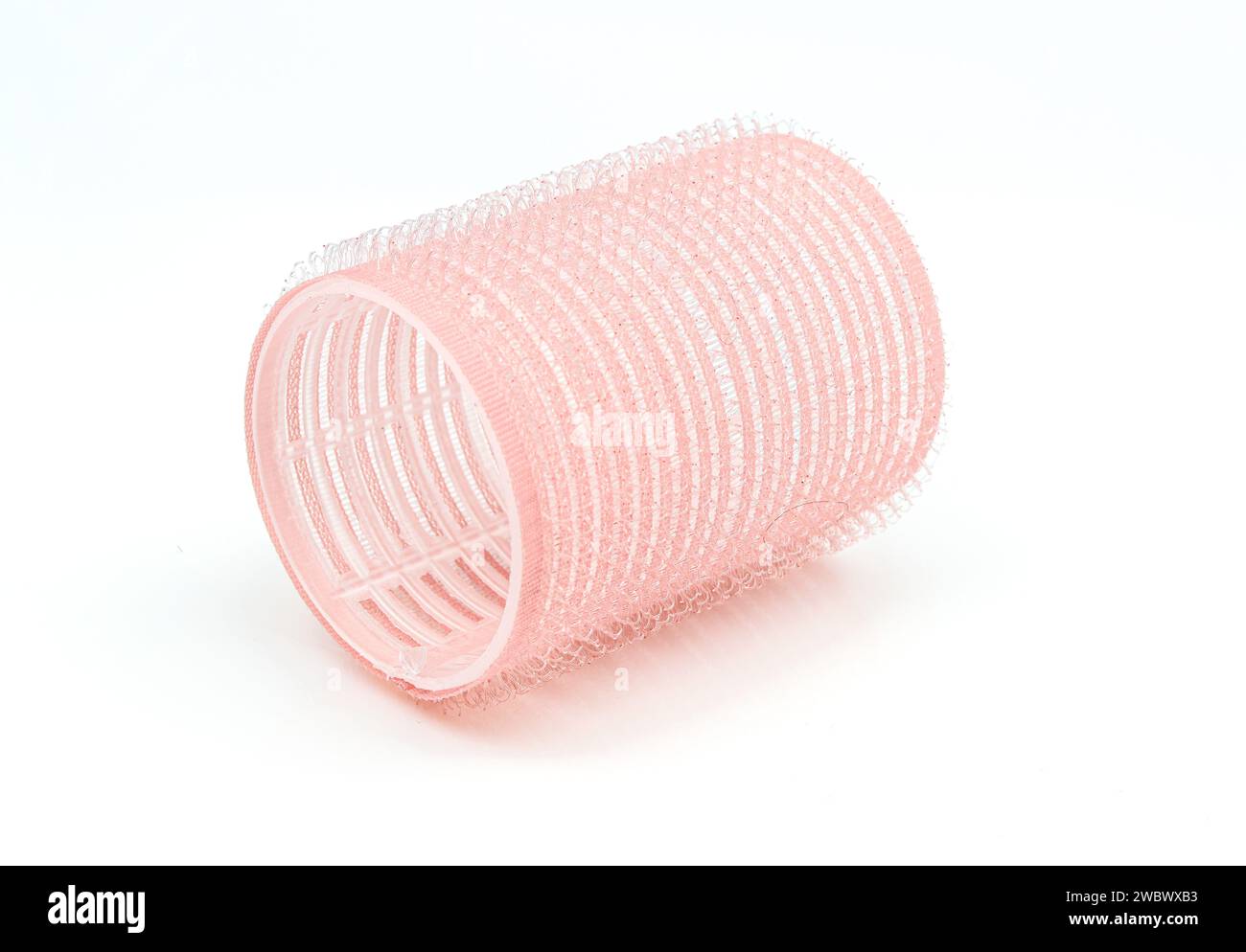 Single plastic hair curler isolated on white background Stock Photo - Alamy