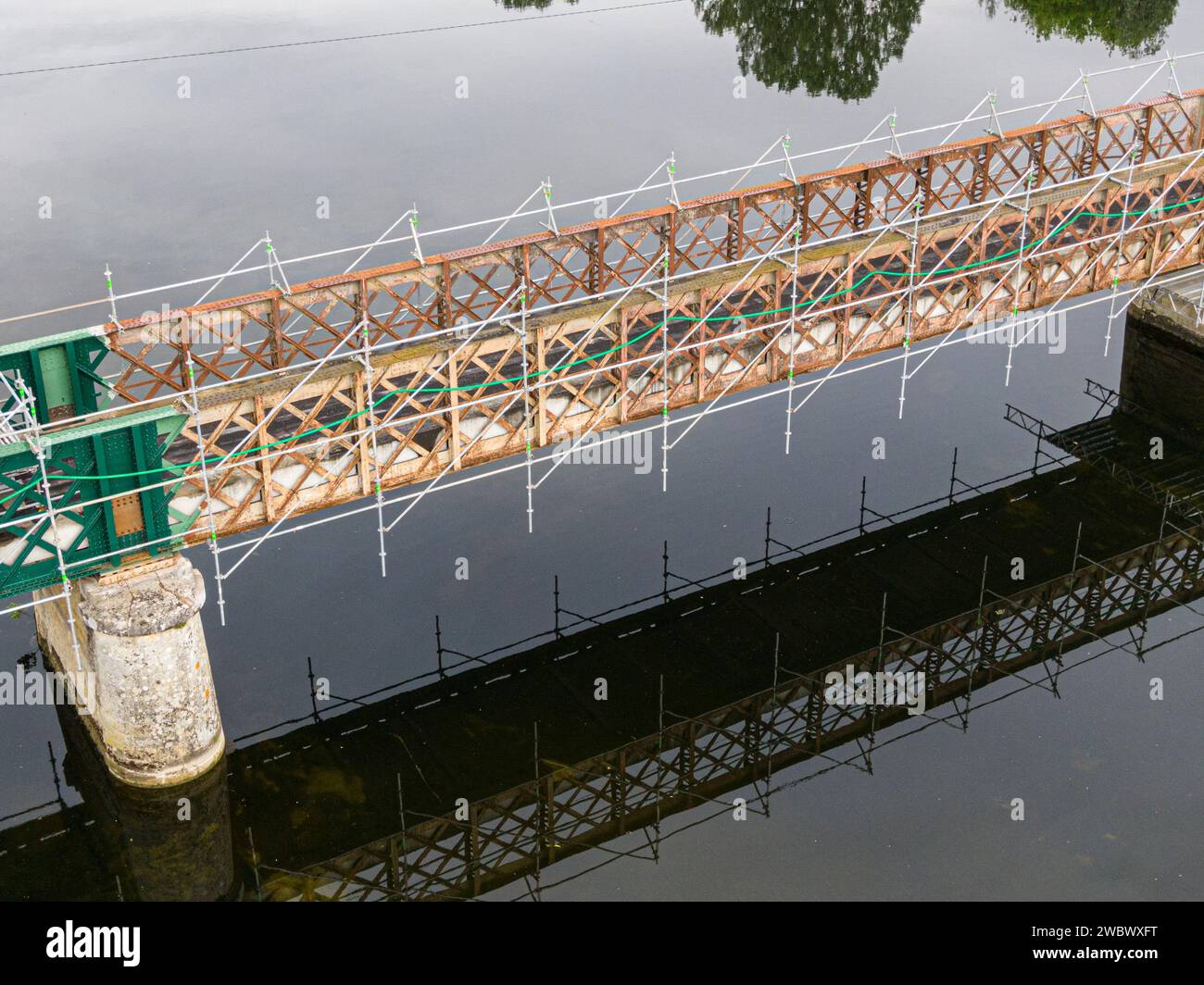 Scaffolding used for maintenance or restoration work on a small bridge ...