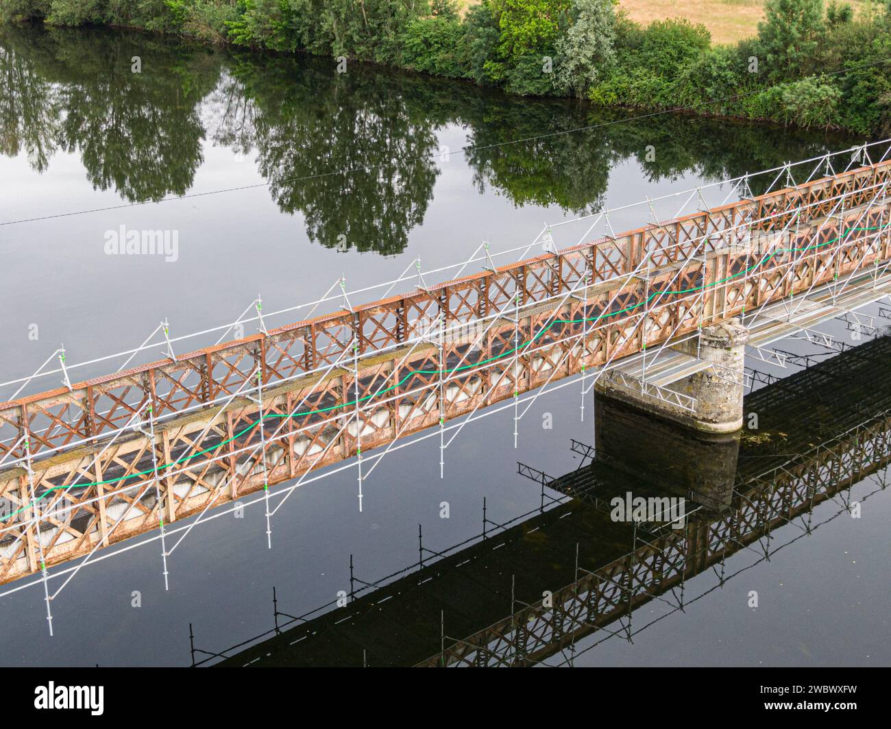 Scaffolding used for maintenance or restoration work on a small bridge ...