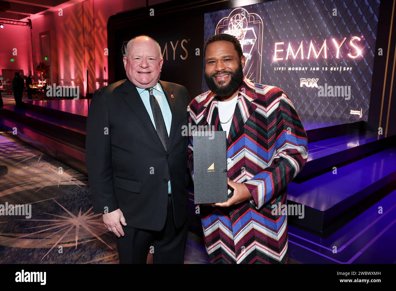 Joe Spellman of JUSTIN and Host Anthony Anderson at the 75th Emmy ...