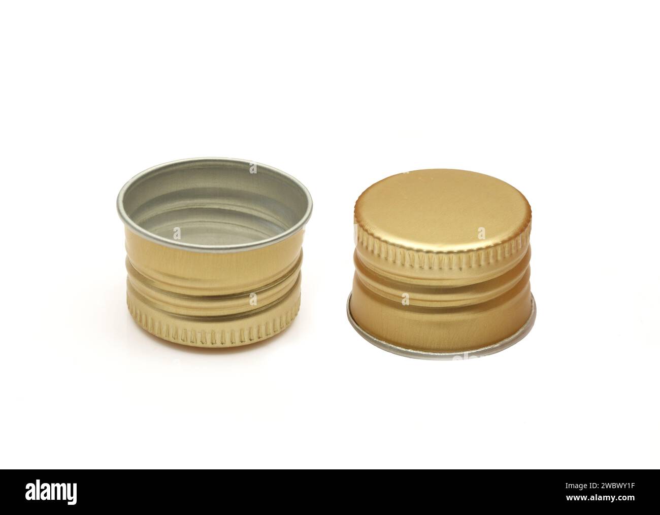 Golden color metal bottle cap two sides isolated on white background ...