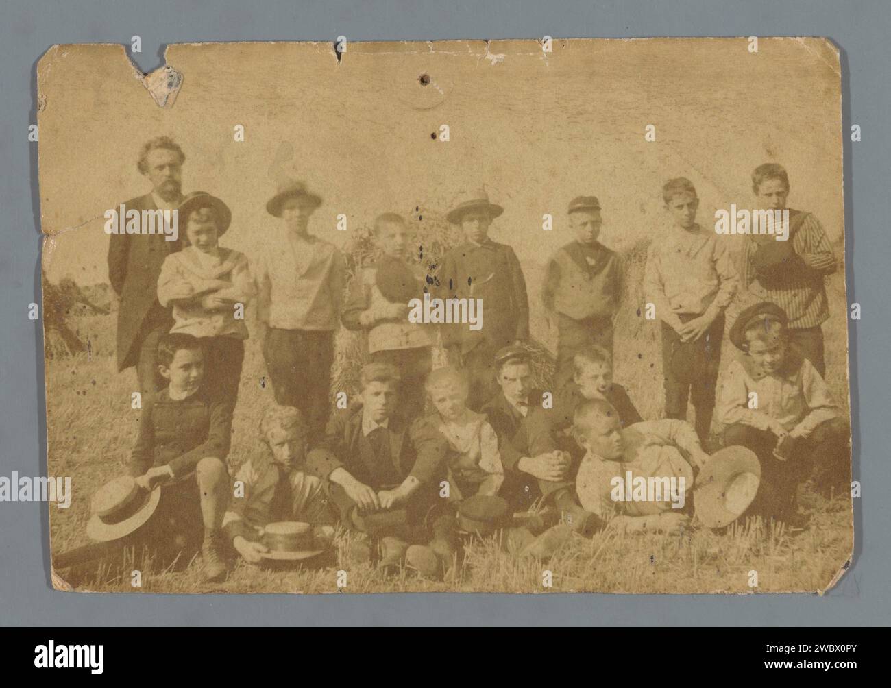 Group portrait of (presumably) a class of a boys' school with a teacher ...