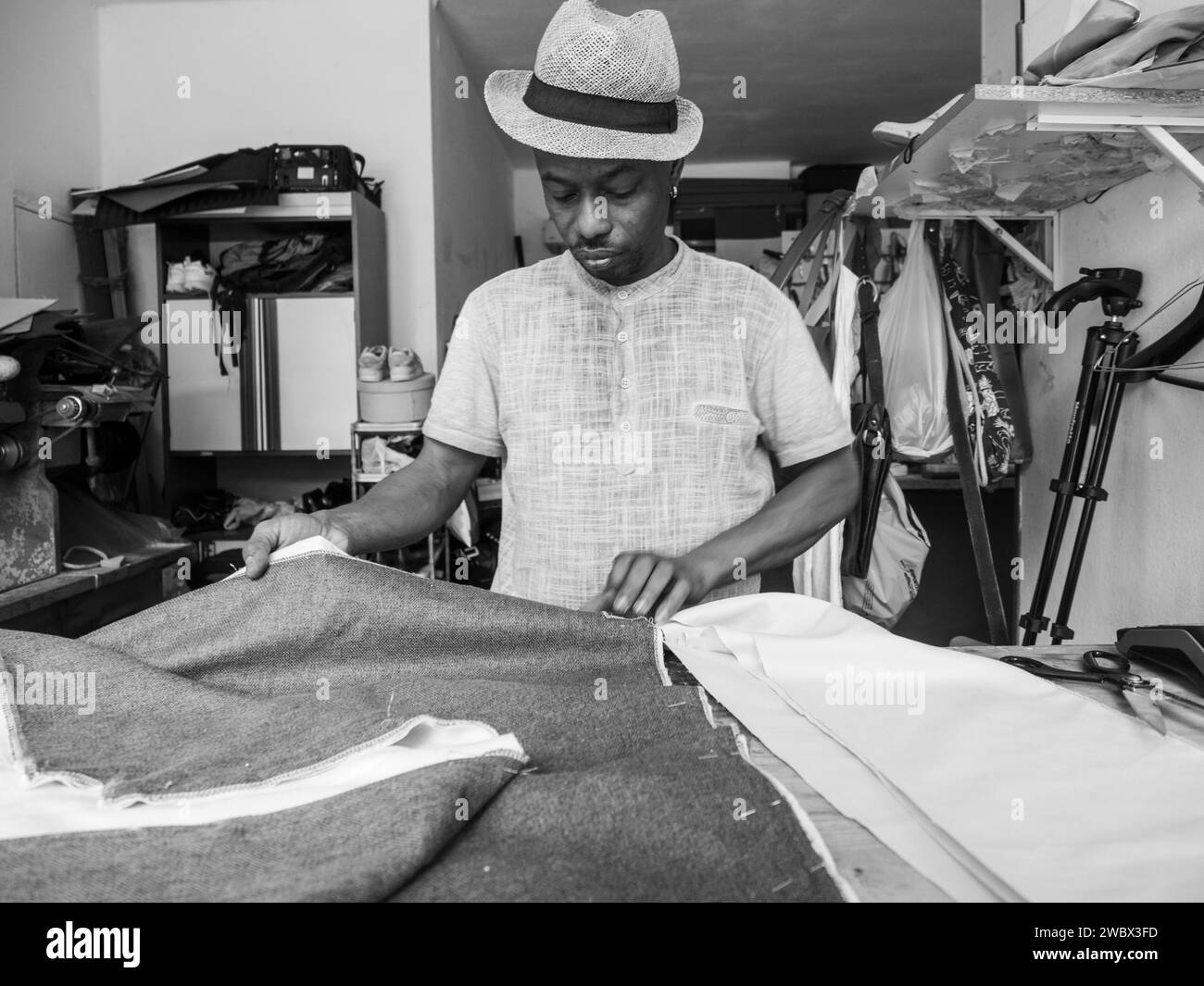 African seamstress shop Black and White Stock Photos & Images - Alamy