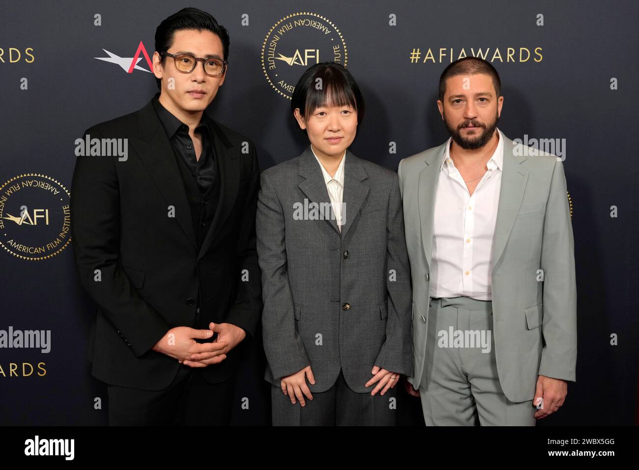 Teo Yoo, from left,Celine Song, and John Magaro arrive at the AFI ...