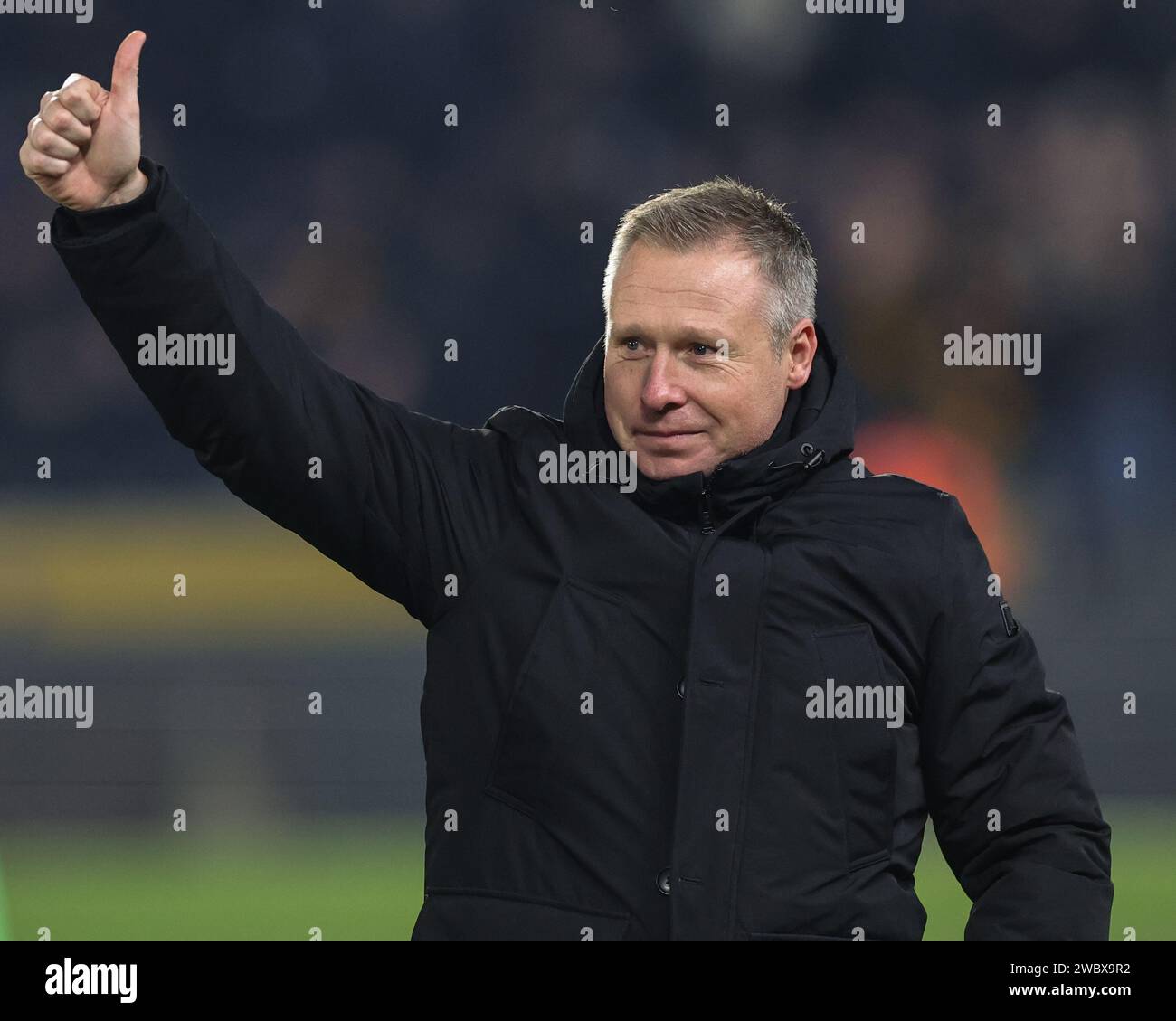 Former Hull City player Nick Barmby gives the fans a thumbs up during ...