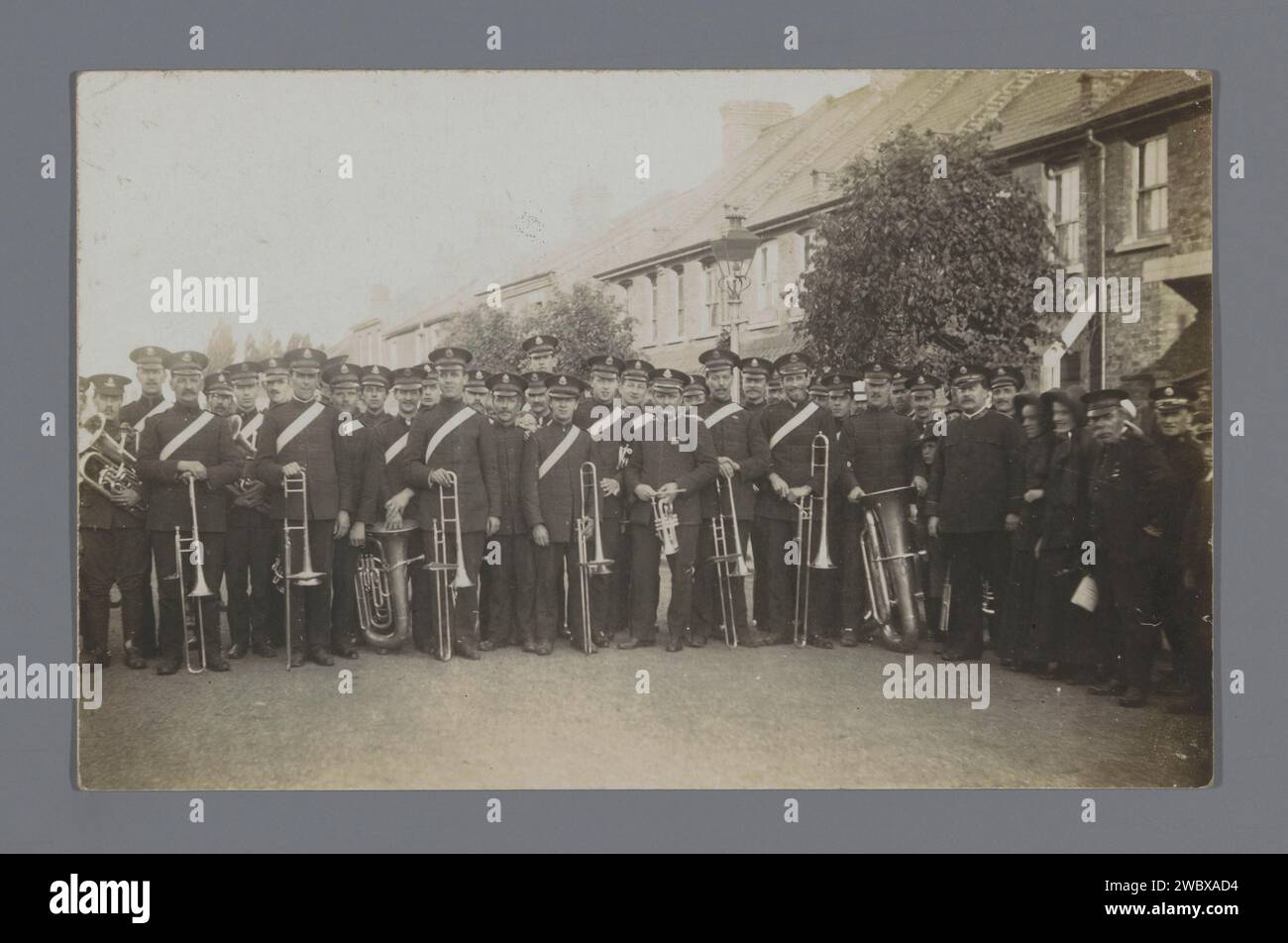Group portrait of members of the Salvation Army with wind instruments ...