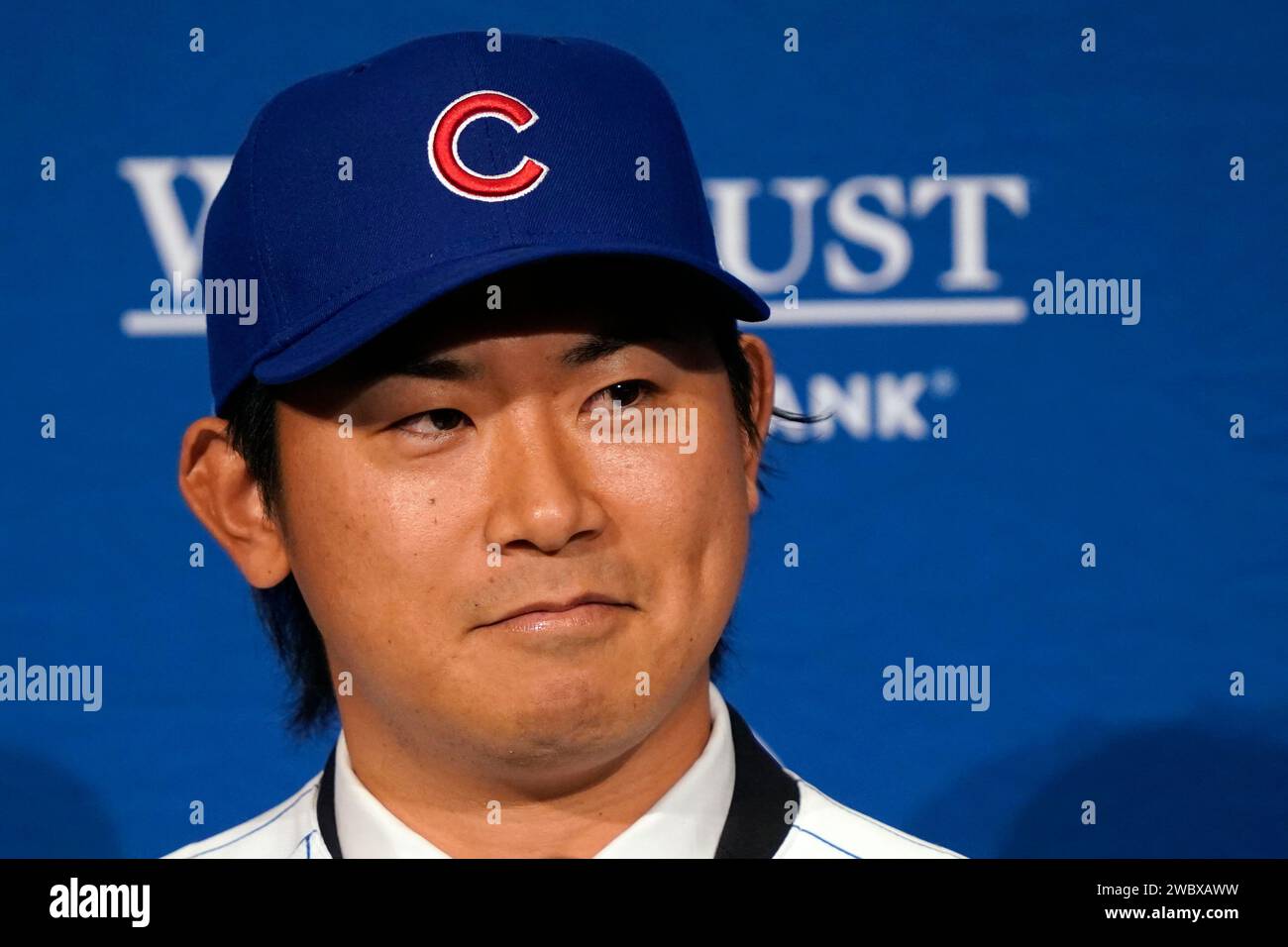New Chicago Cubs pitcher Shōta Imanaga takes part in a news conference ...