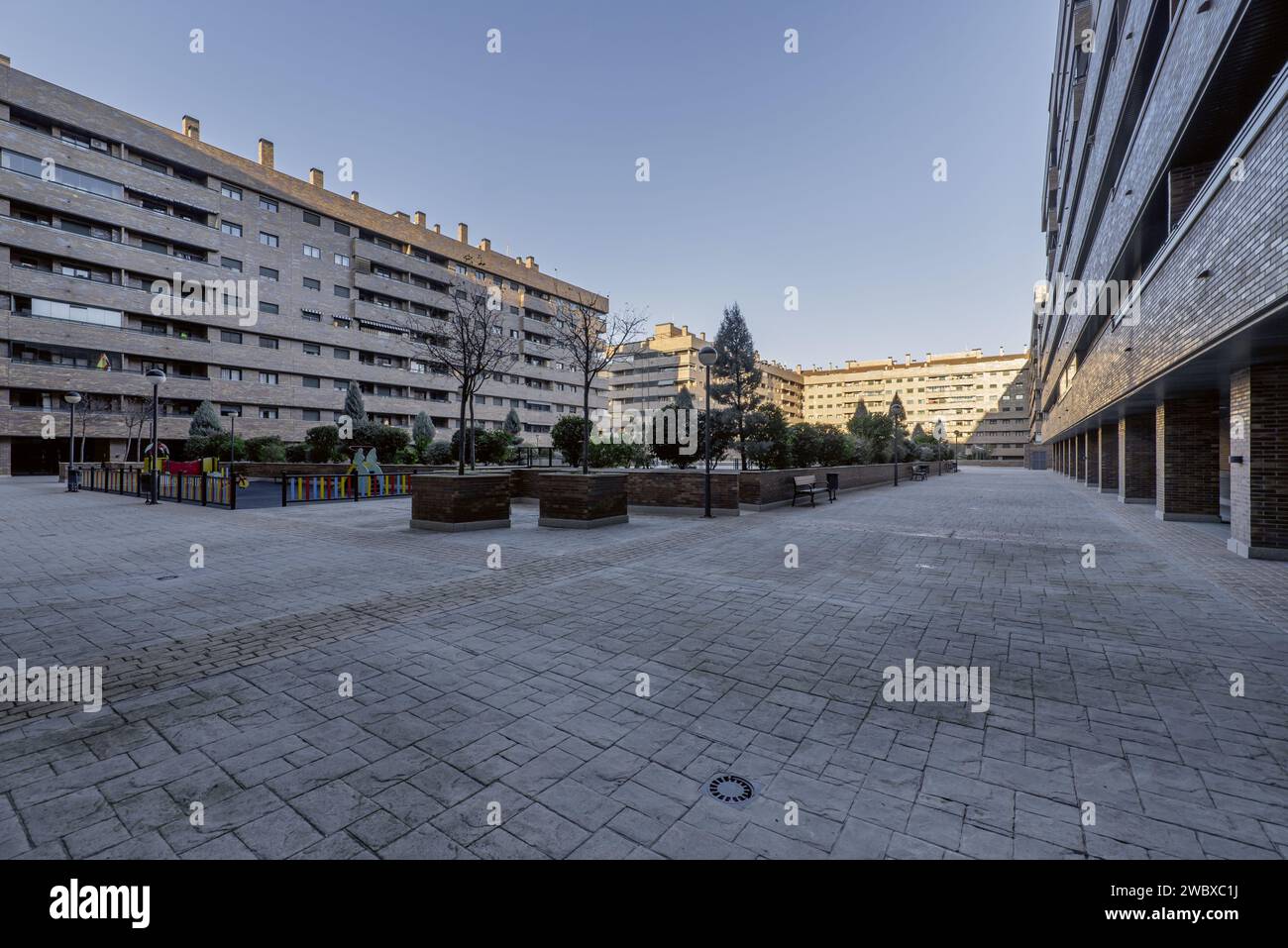 Large common areas with swimming pools and a playground within a ...