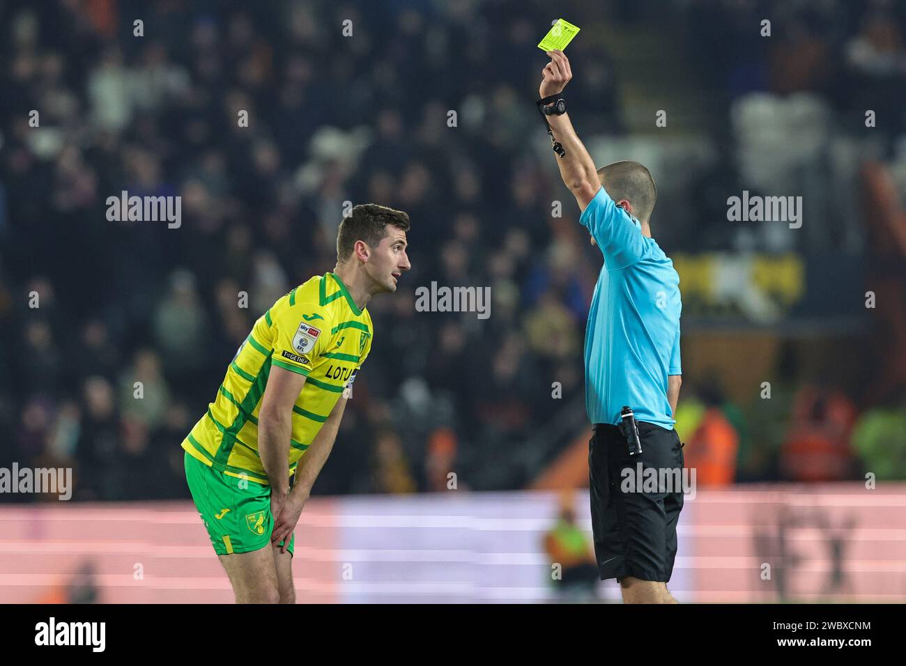 Kenny McLean of Norwich City receives a yellow card from referee Andrew ...