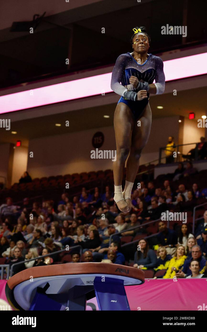 Michigan's Gabby Wilson competes on the vault during an NCAA gymnastics ...