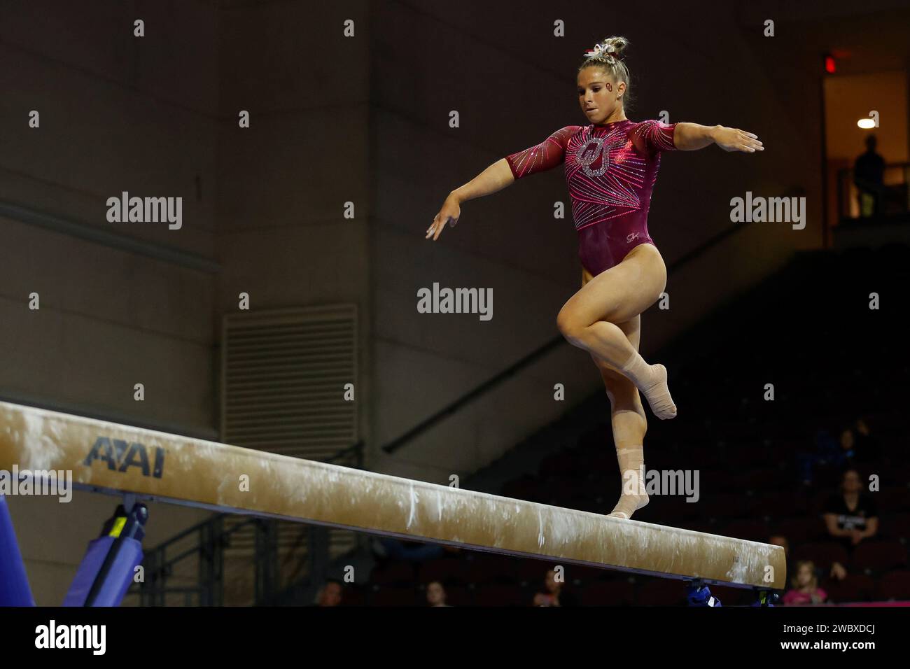 Oklahoma's Ragan Smith competes on the balance beam during an NCAA ...
