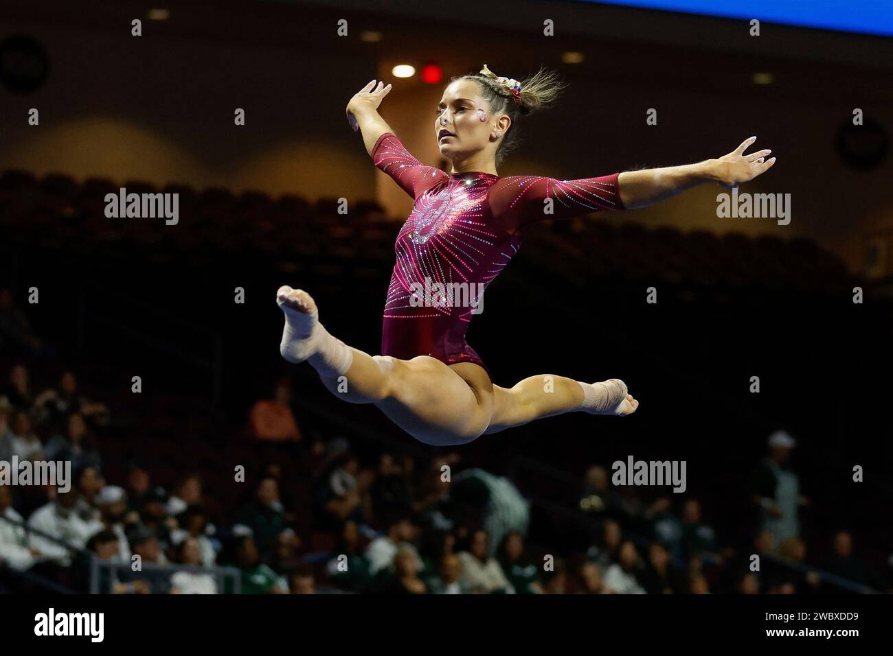 Oklahoma's Jordan Bowers competes on the floor exercise during an NCAA ...