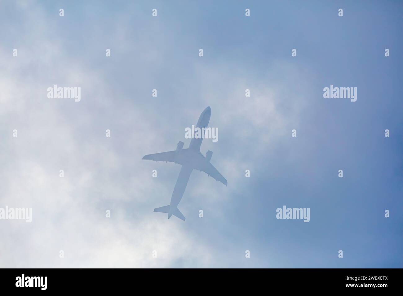 Airplane wing passing clouds hi-res stock photography and images - Alamy
