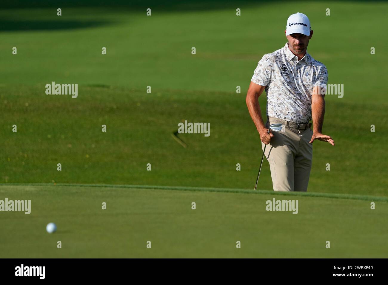 Hunter Larson follows his shot on the 10th green during the second ...