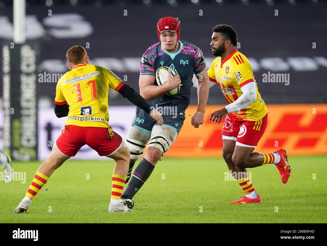 Ospreys' James Fender (right) in action with USA Perpignan's Lucas ...