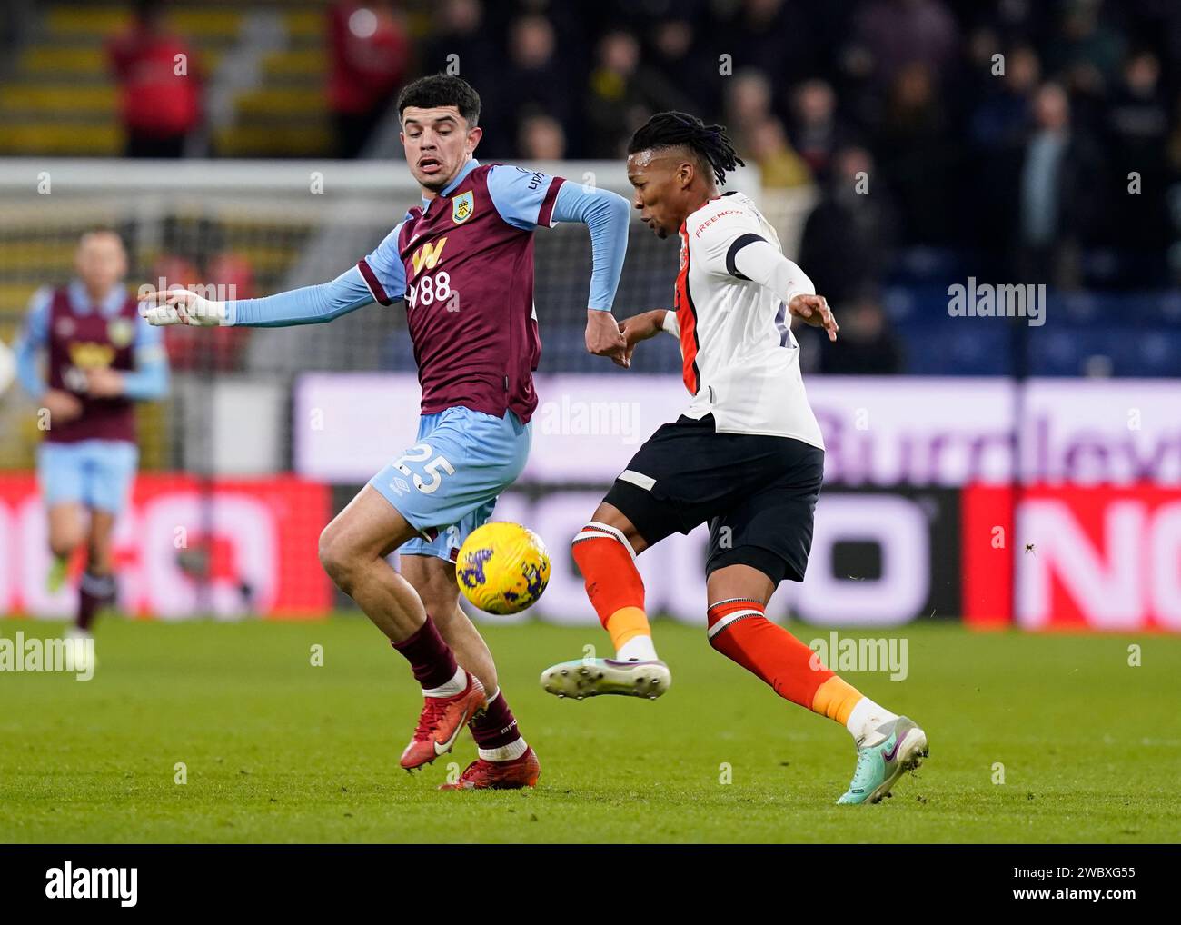 Burnley, UK. 12th Jan, 2024. Zeki Amdouni of Burnley and Gabriel Osho ...