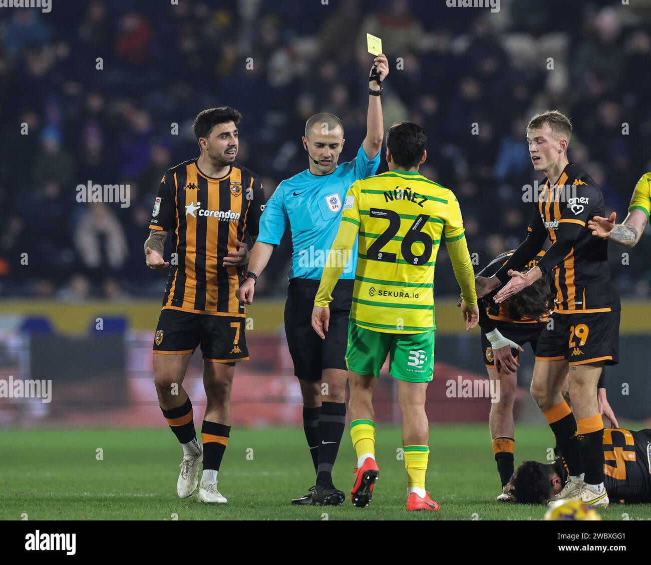 Referee Andrew Kitchen gives a yellow card to Marcelino Núñez of ...