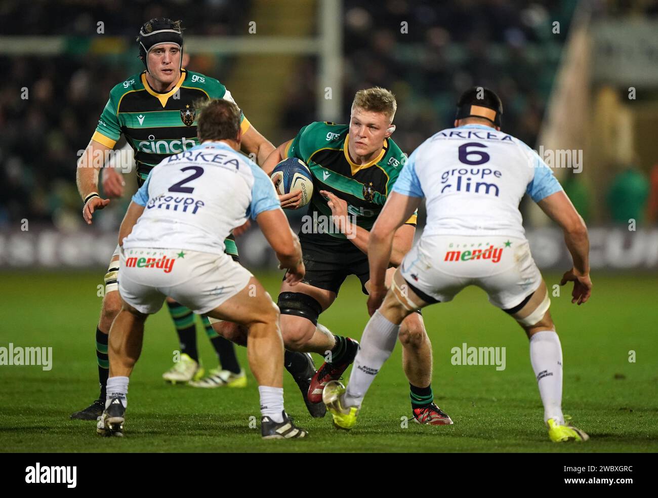 Northampton Saints' Tom Pearson (centre) takes on Aviron Bayonnais ...
