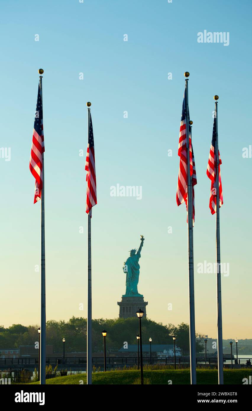 American flags with Statue of Liberty, Liberty State Park, New Jersey ...