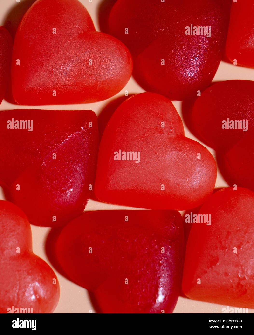 red heart shaped candies stuck together in a grid, tilted view Stock ...
