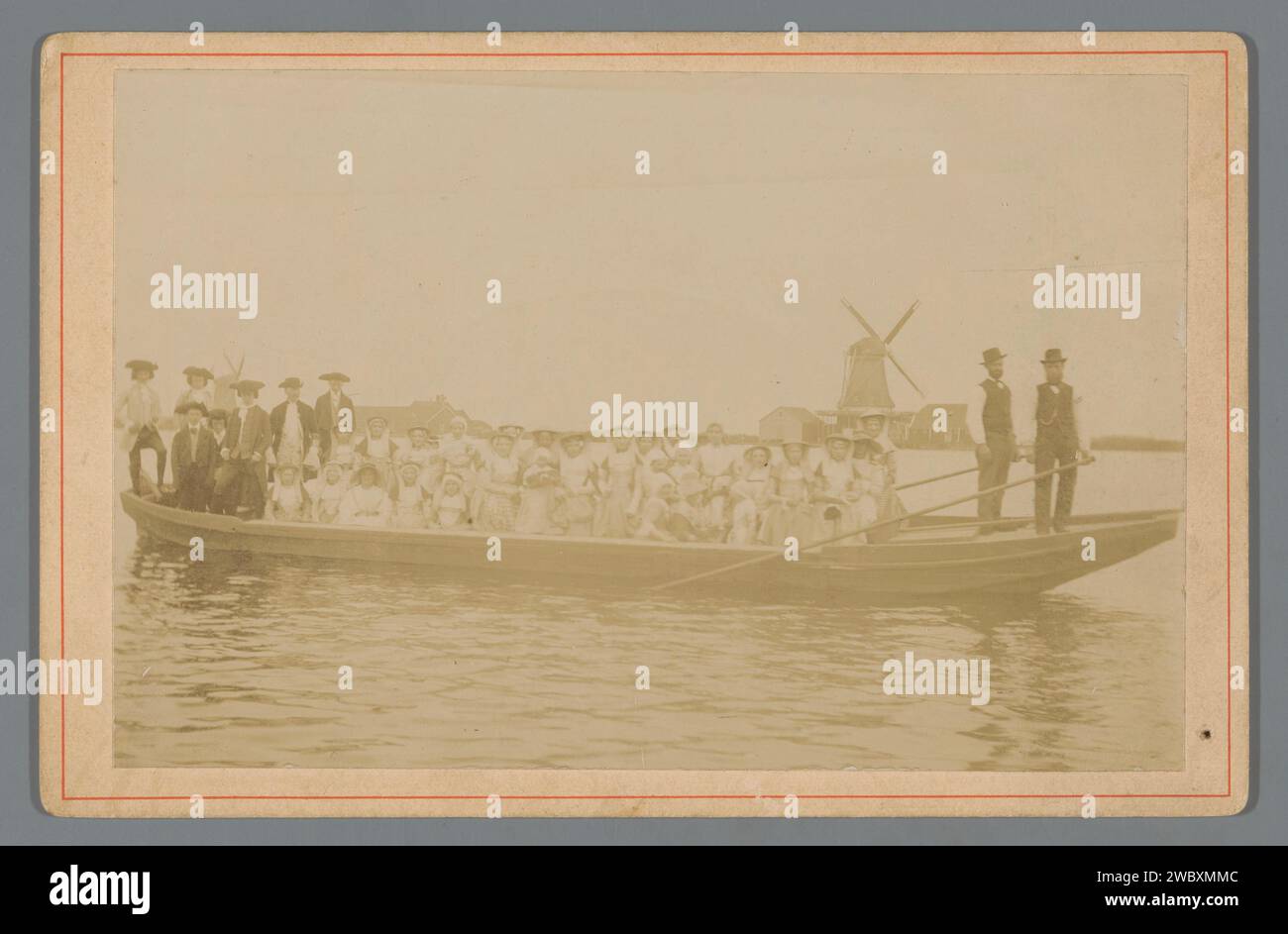 Group portrait of Mannen and Women in traditional costume on a barge ...