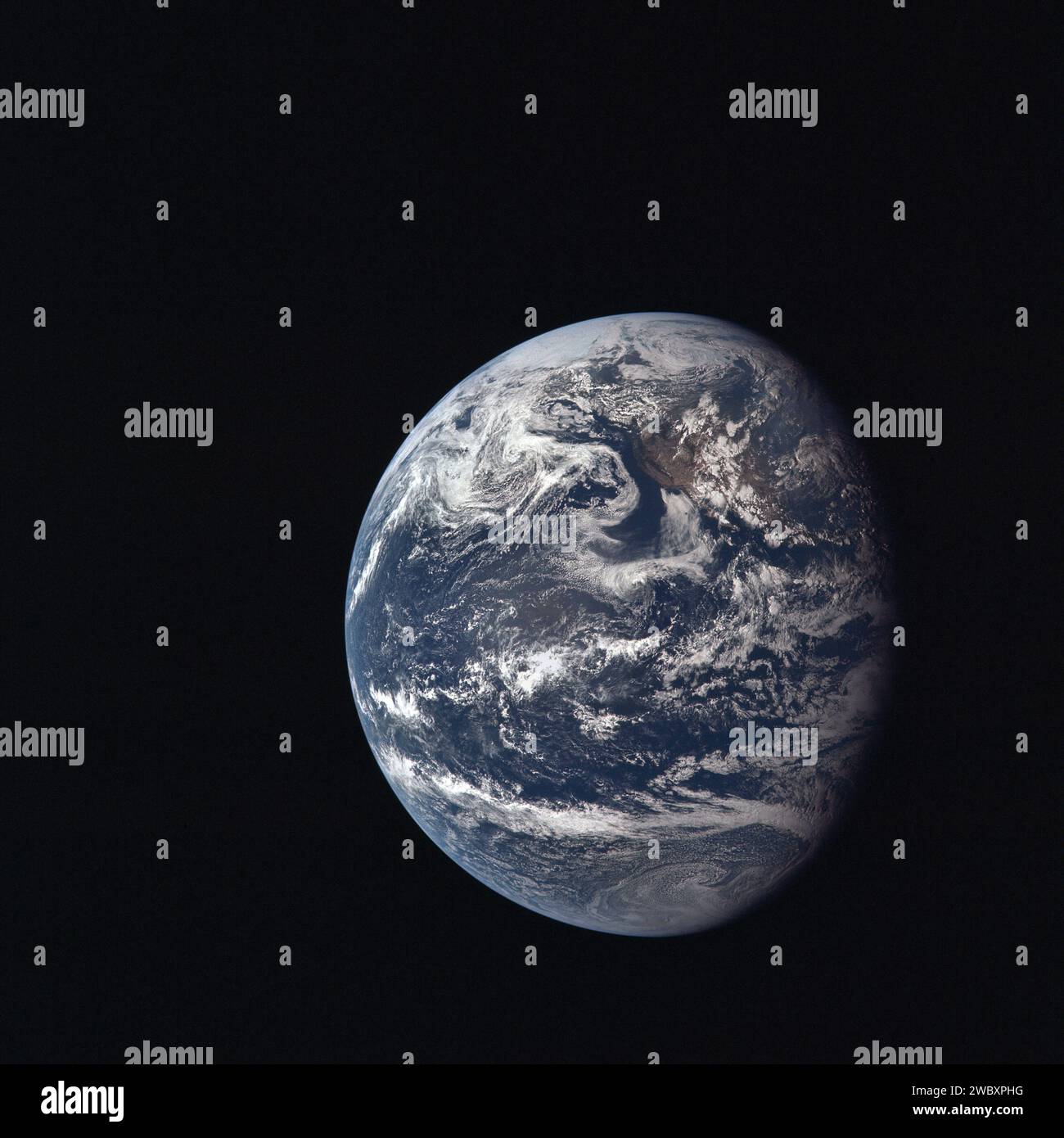 View of Earth taken by Apollo 11 crewmember during its trans-lunar ...