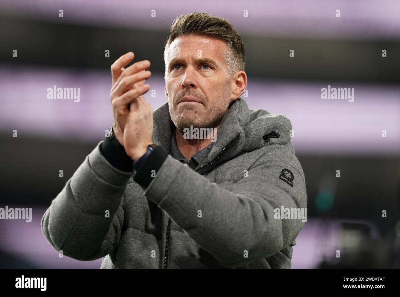 Luton Town manager Rob Edwards applauds the fans after the Premier ...