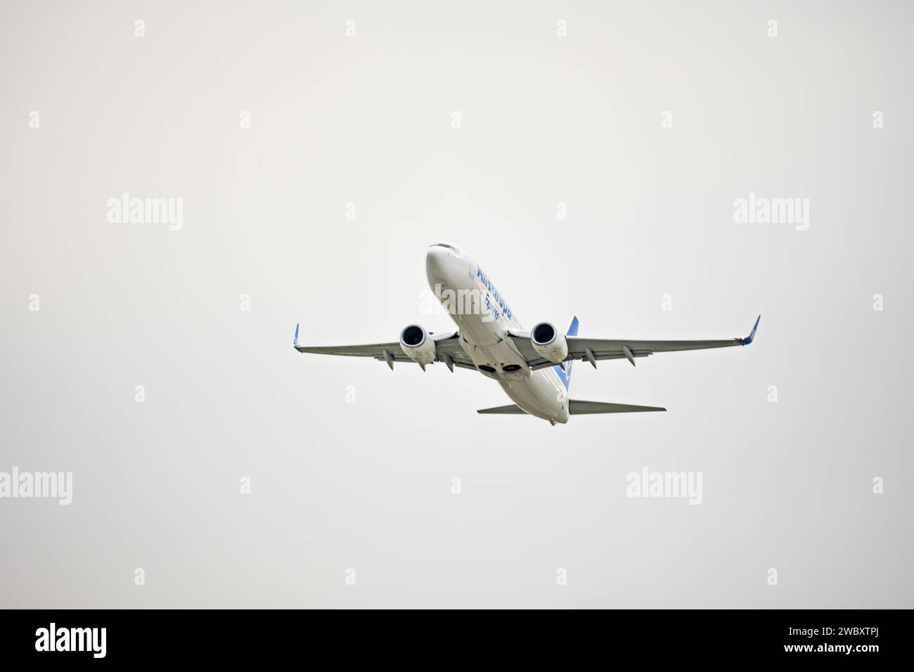 A passenger plane taking off Stock Photo - Alamy