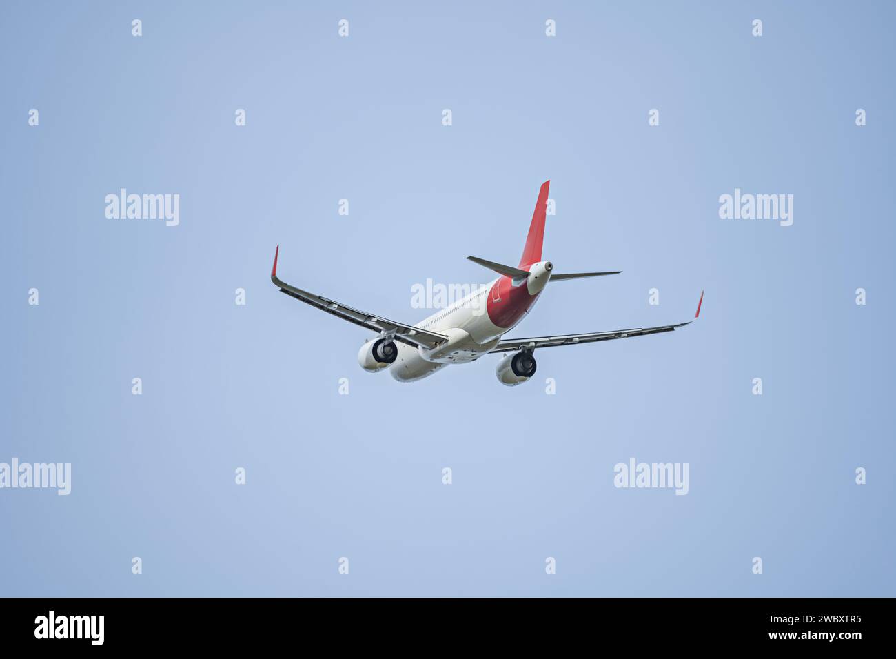 Rear of a passenger plane in flight Stock Photo - Alamy