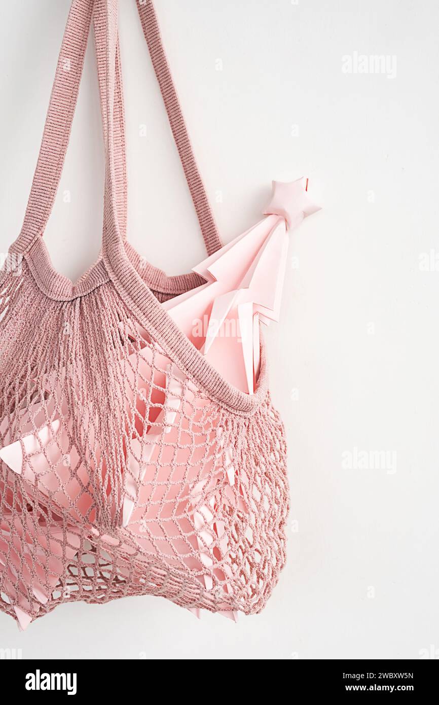 Origami Christmas tree in mesh shopping bag. Zero waste holiday ...