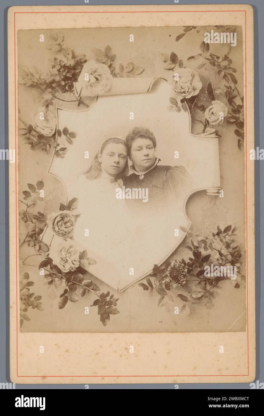 Portrait of an unknown mother and daughter in a frame with flowers ...
