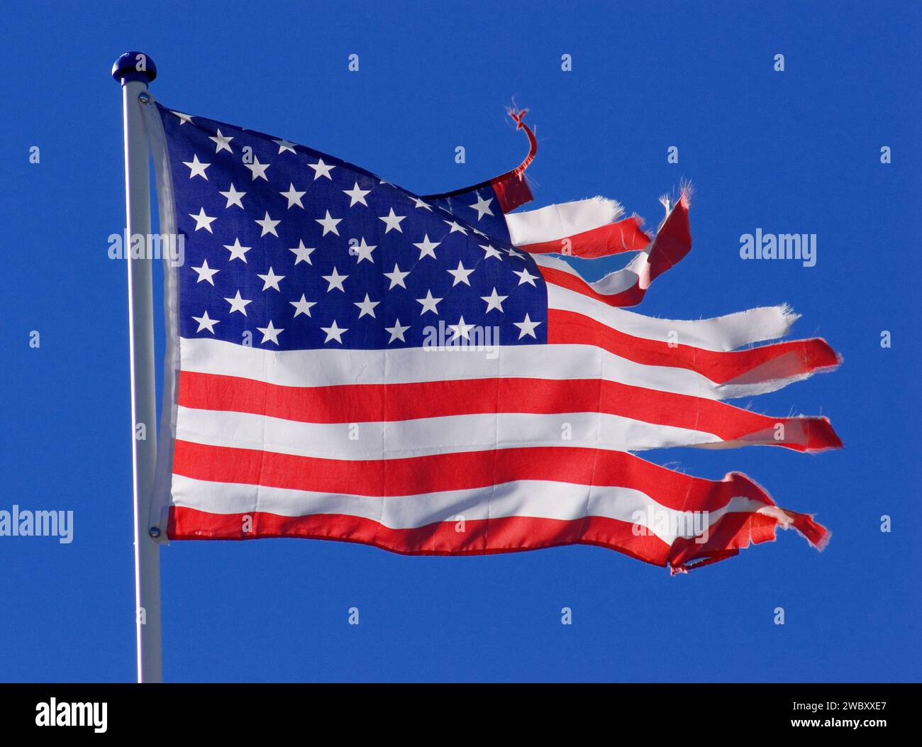 stars and stripes, US national flag, torn, ripped, tattered, flutters ...